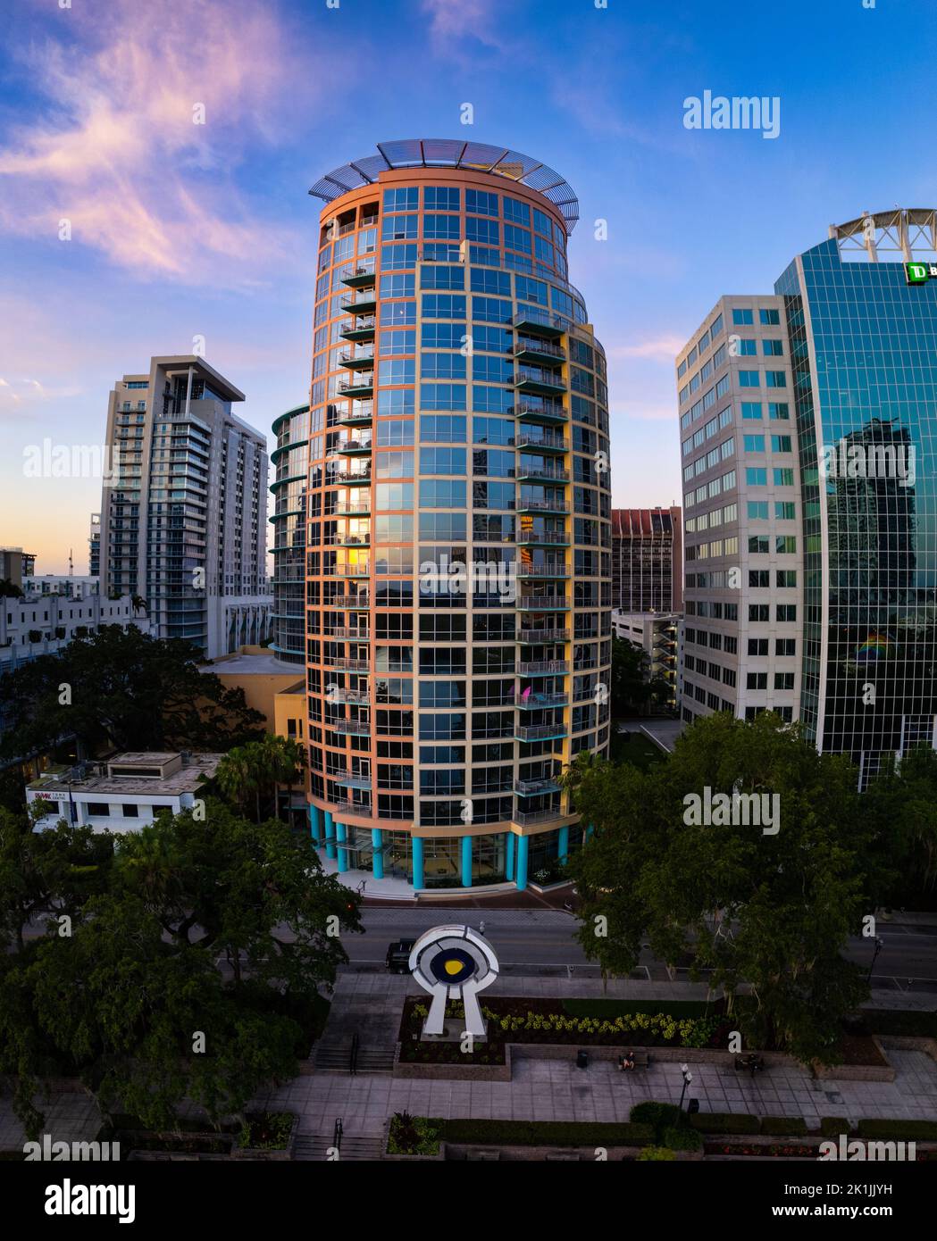 The vertical aerial view of downtown Orlando buildings under the blue ...