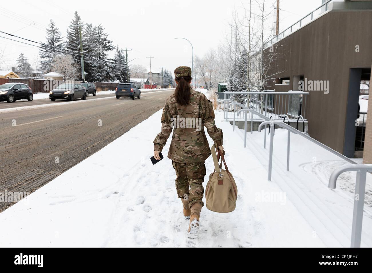 Rear view female soldier walking hi-res stock photography and images ...