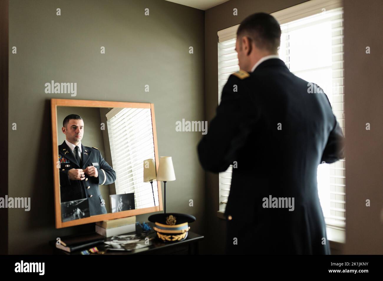 Putting on dress hi-res stock photography and images - Alamy