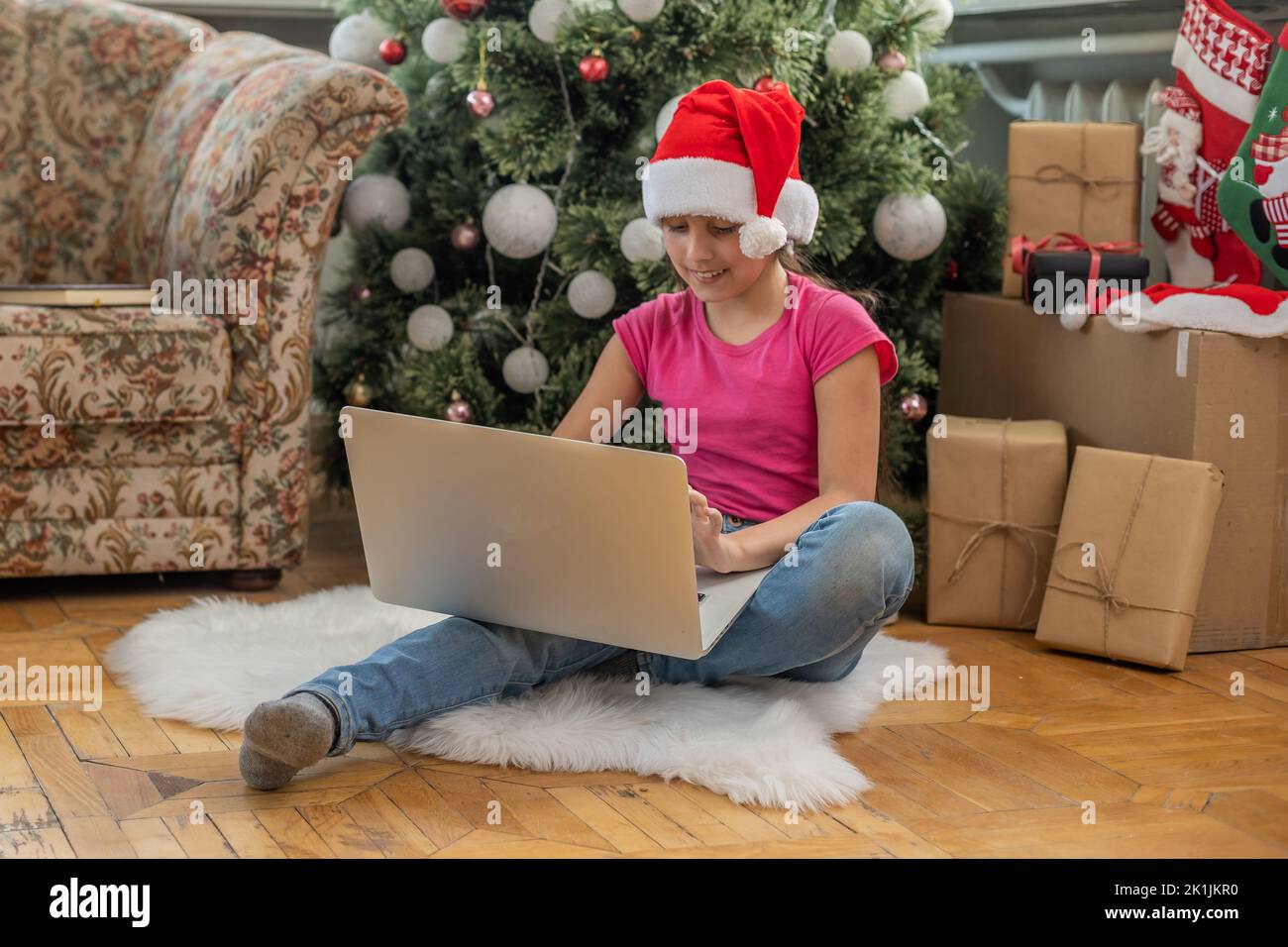 winter holidays, technology and children concept - little student girl ...