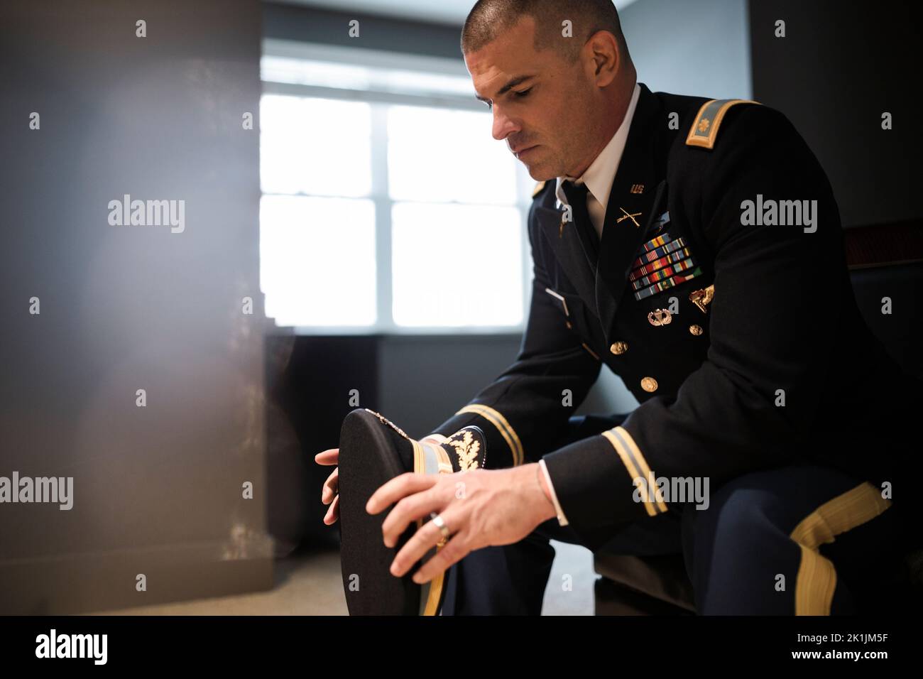 Uniform sitting hi-res stock photography and images - Alamy