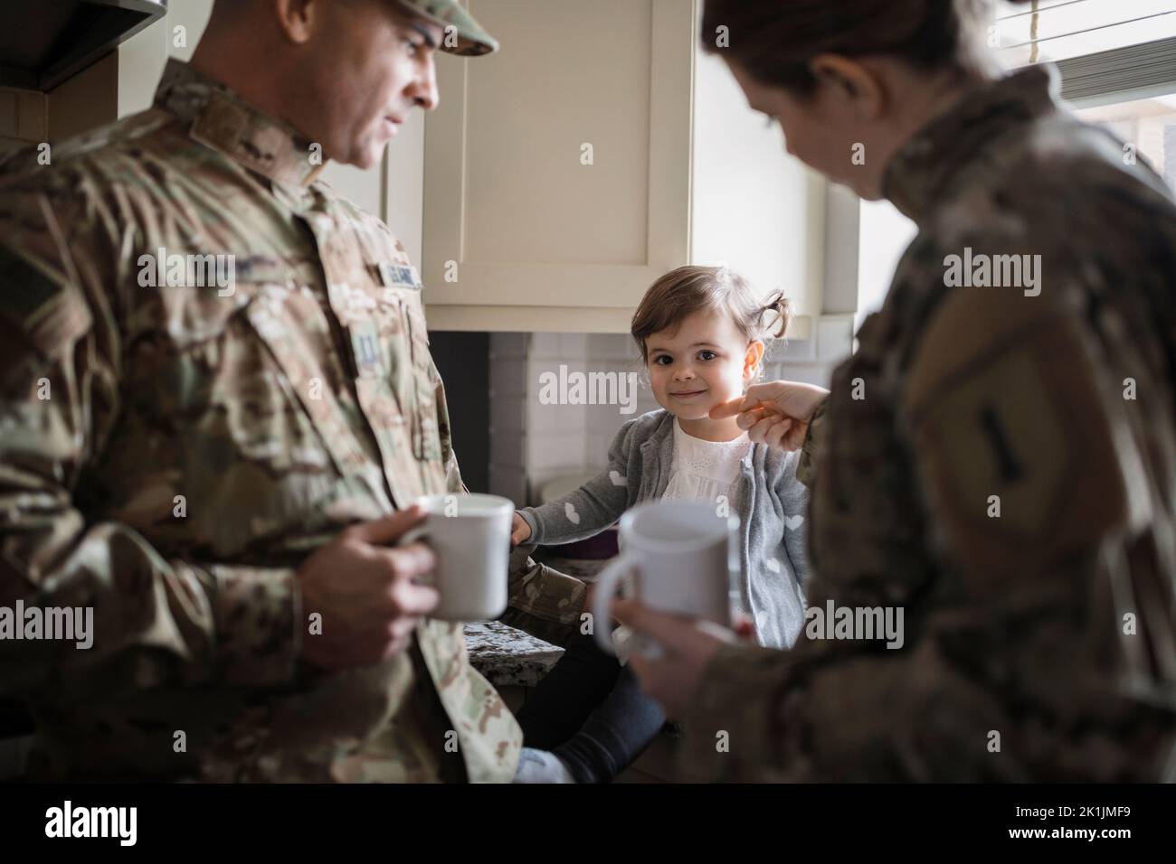 Parents armed with child hi-res stock photography and images - Alamy