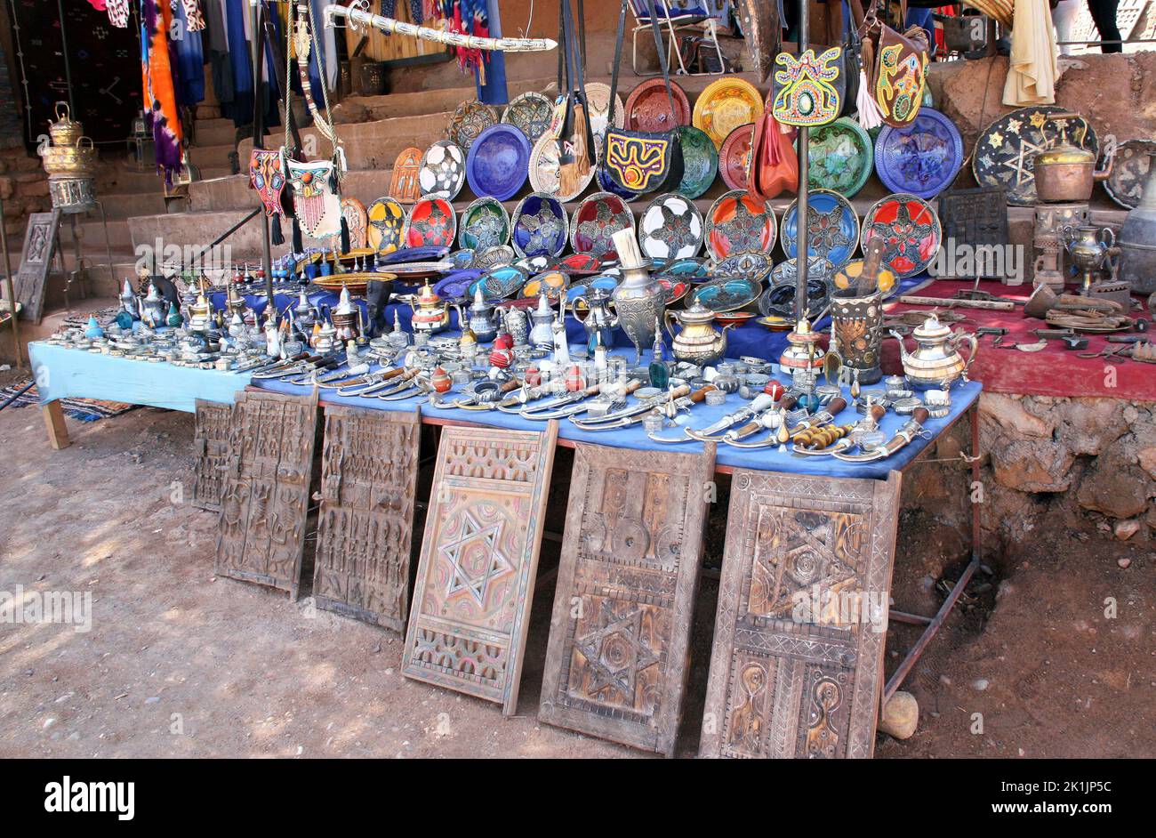Traditional moroccan souvenirs - kettle, plate, dagger, jug, saber ...