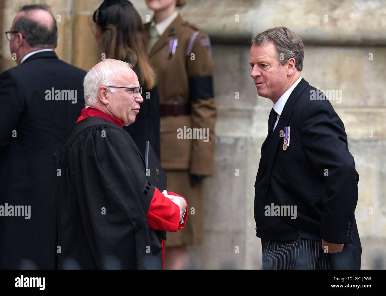 The Dean of Westminster David Hoyle with Scottish Secretary Alister ...