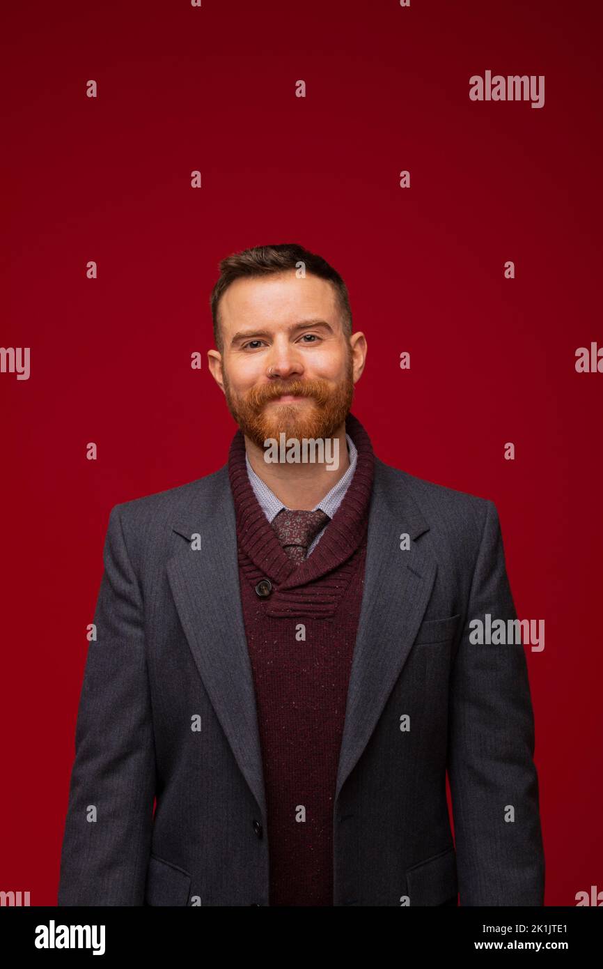 Portrait of a man in a red suit hi-res stock photography and images - Alamy