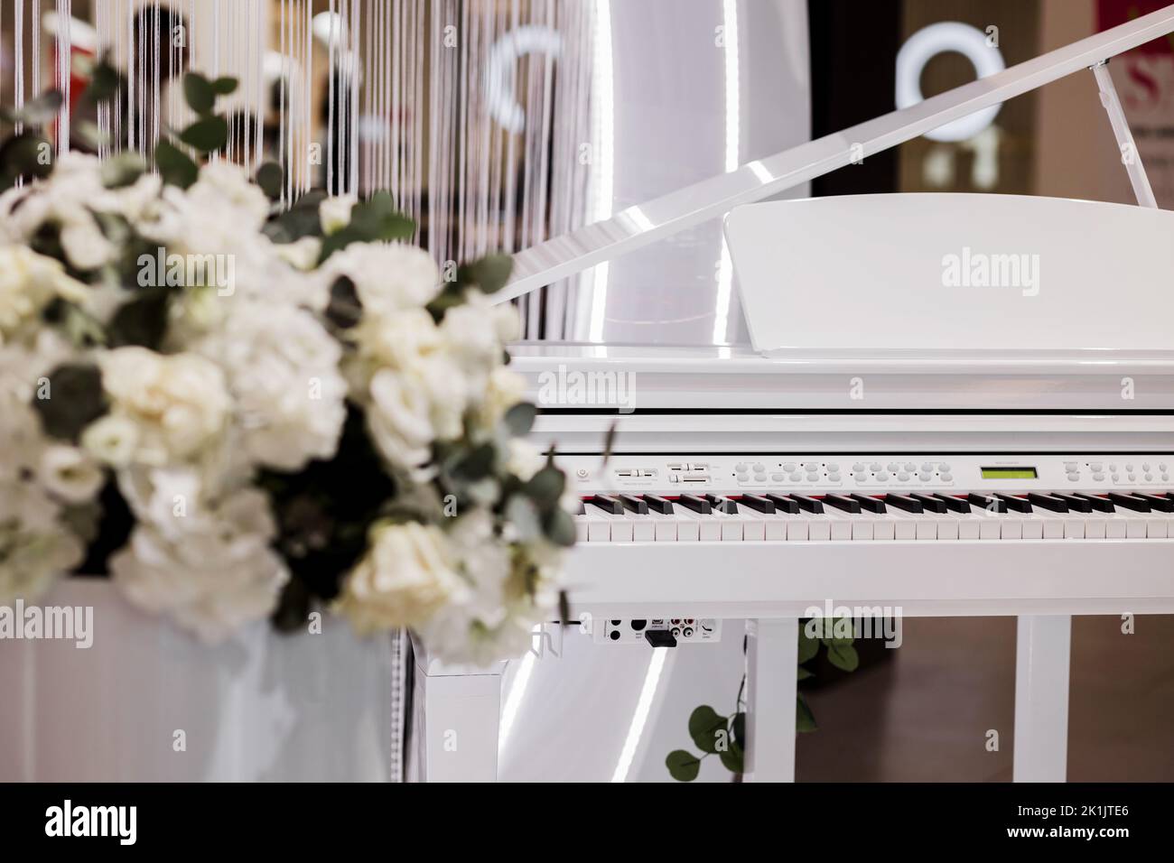 Electronic musical keyboard synthesizer. white piano Stock Photo - Alamy