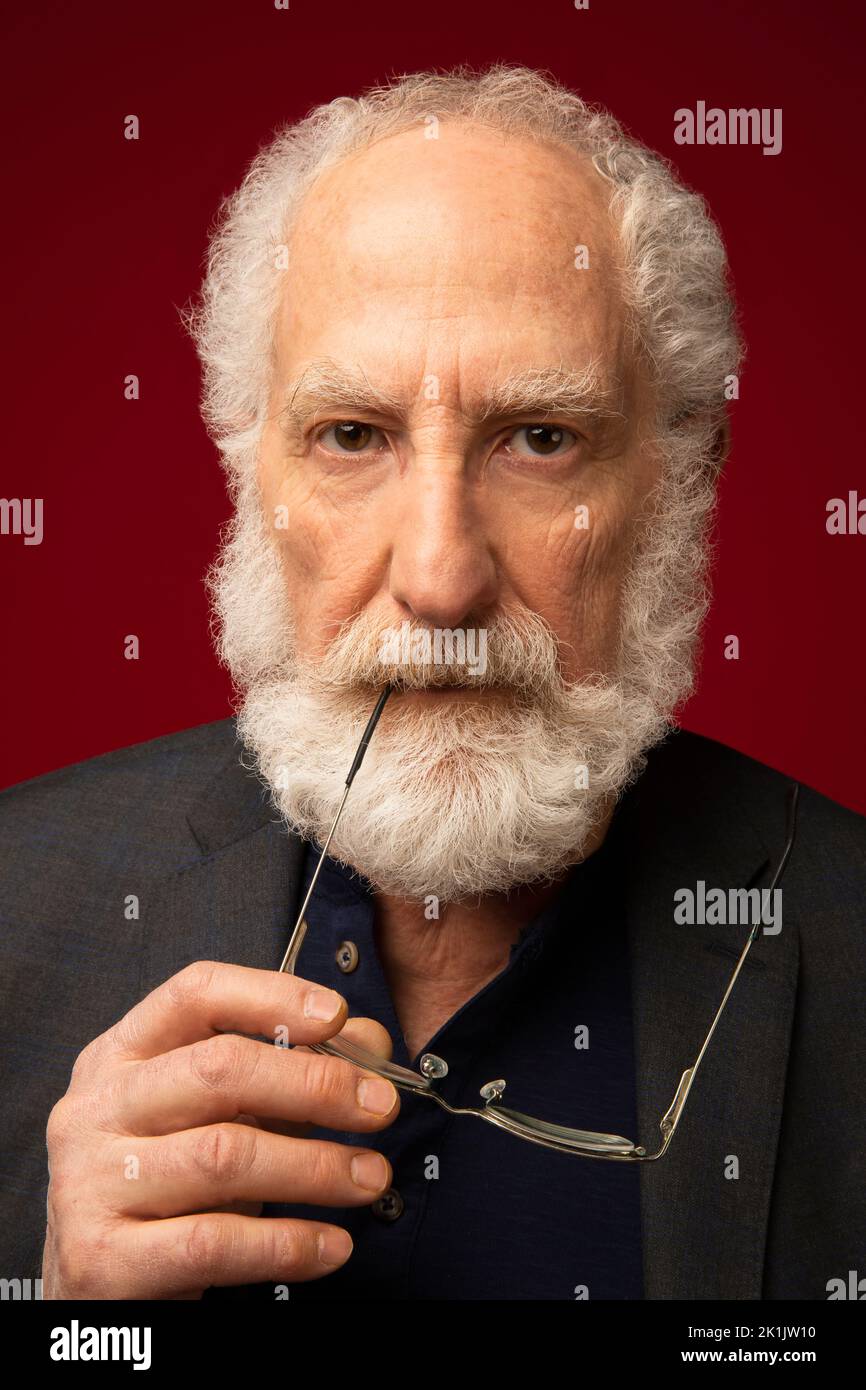 Curly hair brown eyes man portrait hi-res stock photography and images ...