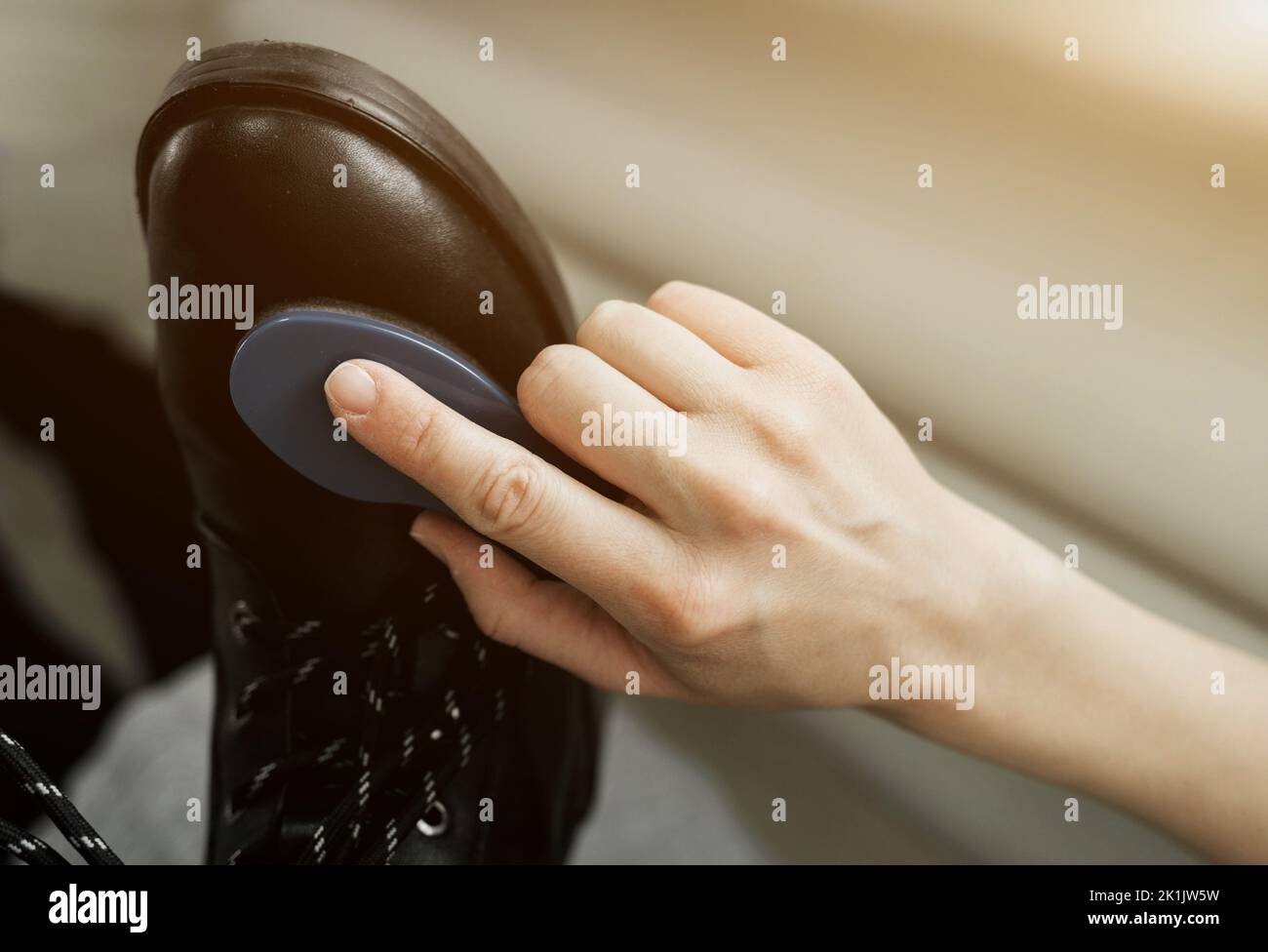 Rubbing boots hi-res stock photography and images - Alamy