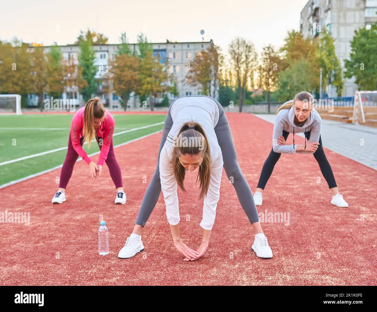Positive women doing sport exercises..The group of three beautiful ...