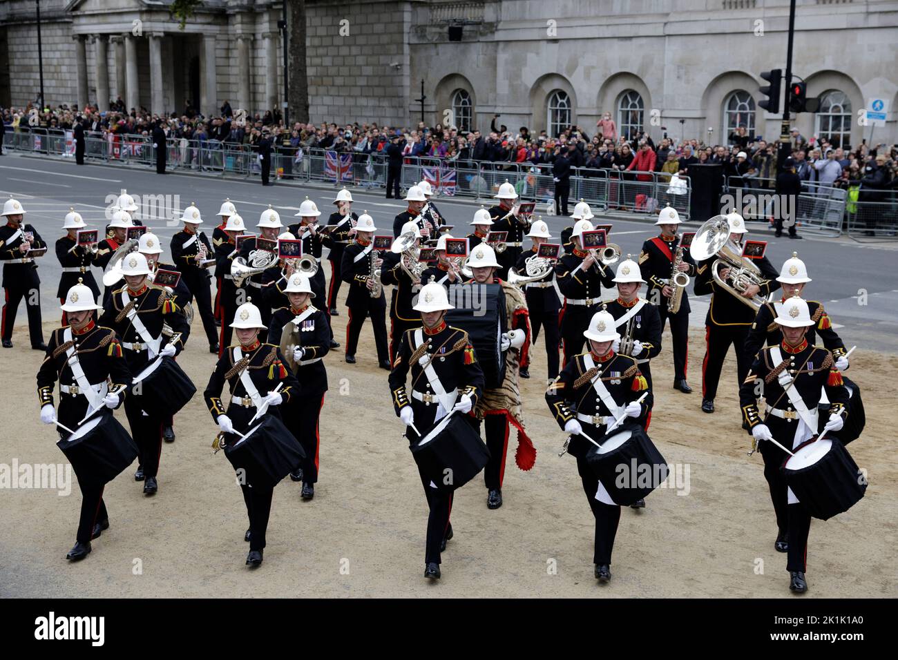 Members of a military marching band walk ahead of the State Funeral of ...