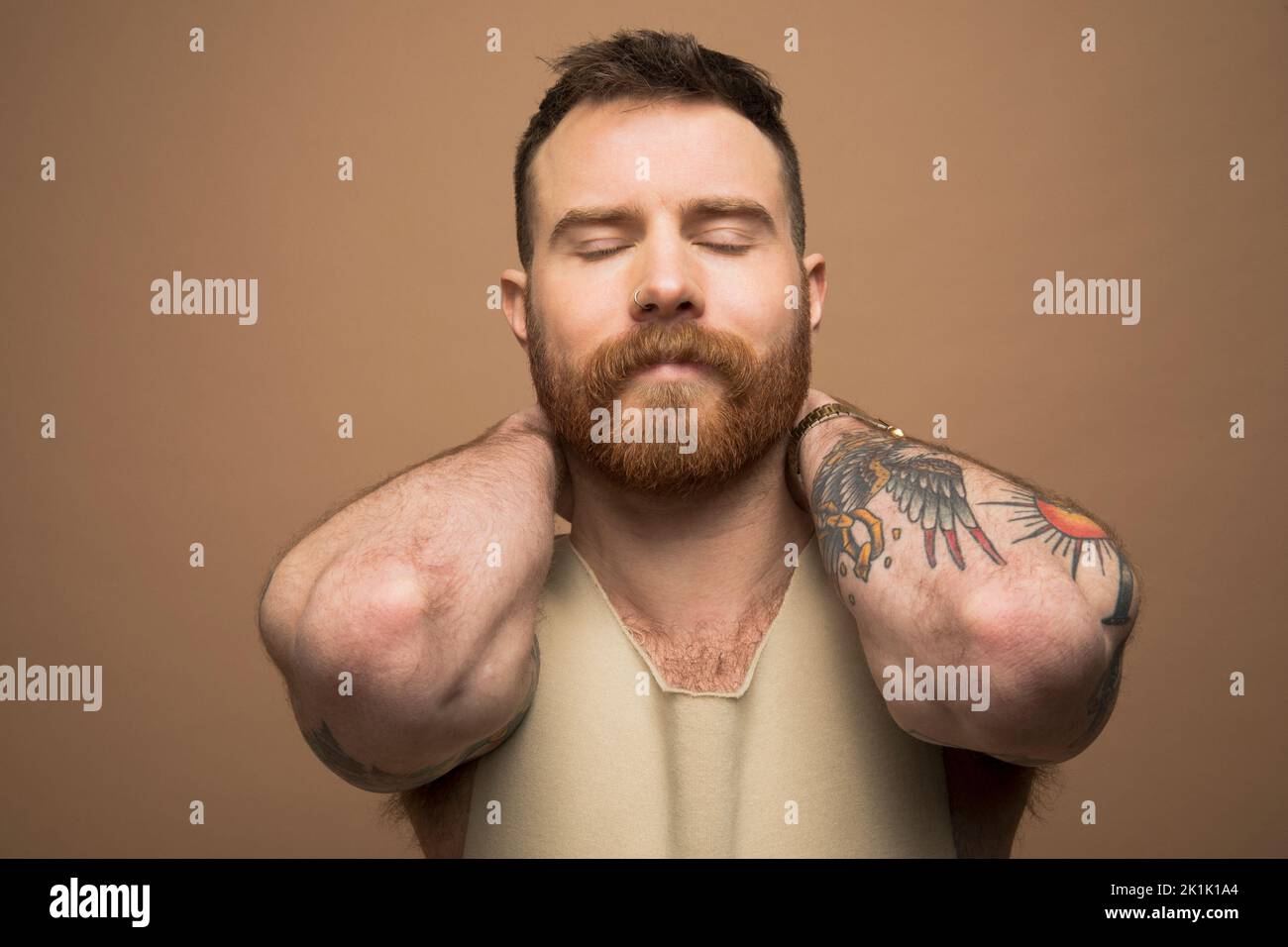 With arm tattoo hi-res stock photography and images - Alamy