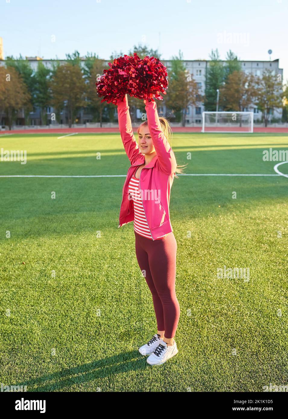 Cheerleaders in action at the stadium. Early morning workout Stock ...