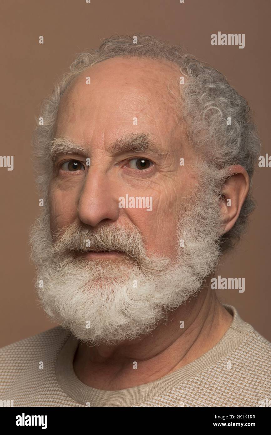 Curly hair brown eyes man portrait hi-res stock photography and images ...