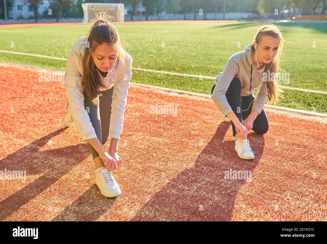 Two girls race track hi-res stock photography and images - Alamy