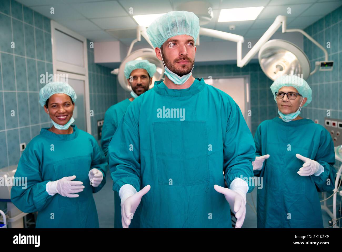 Team of surgeons in the operating room preparing for surgery Stock ...