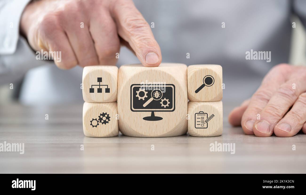 Wooden blocks with symbol of software testing concept Stock Photo - Alamy