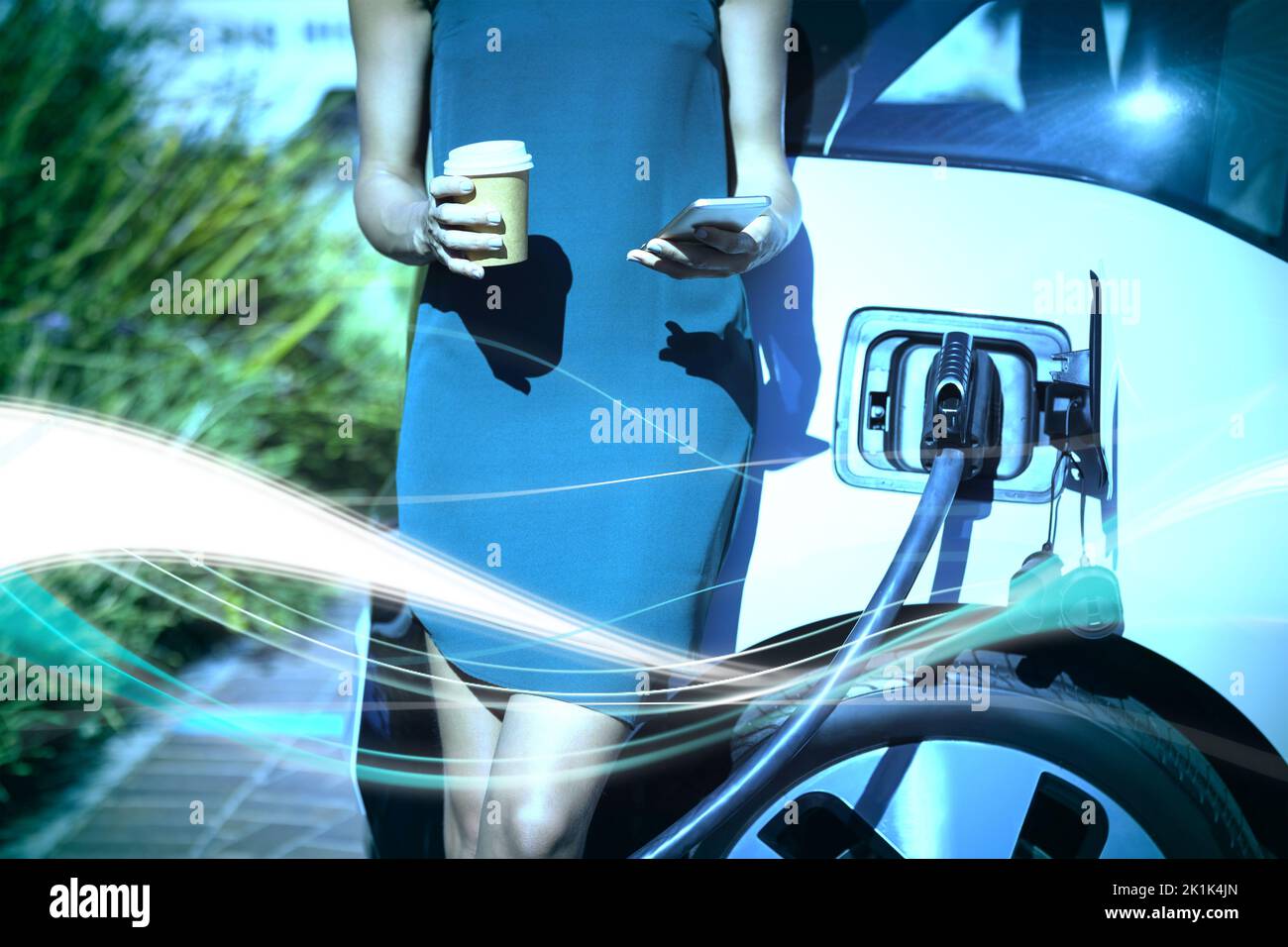 Blue wave design against woman using mobile phone while charging ...