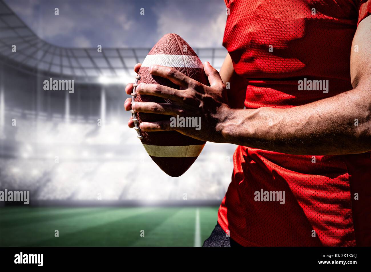 American Football Player against view of a sports arena Stock Photo - Alamy