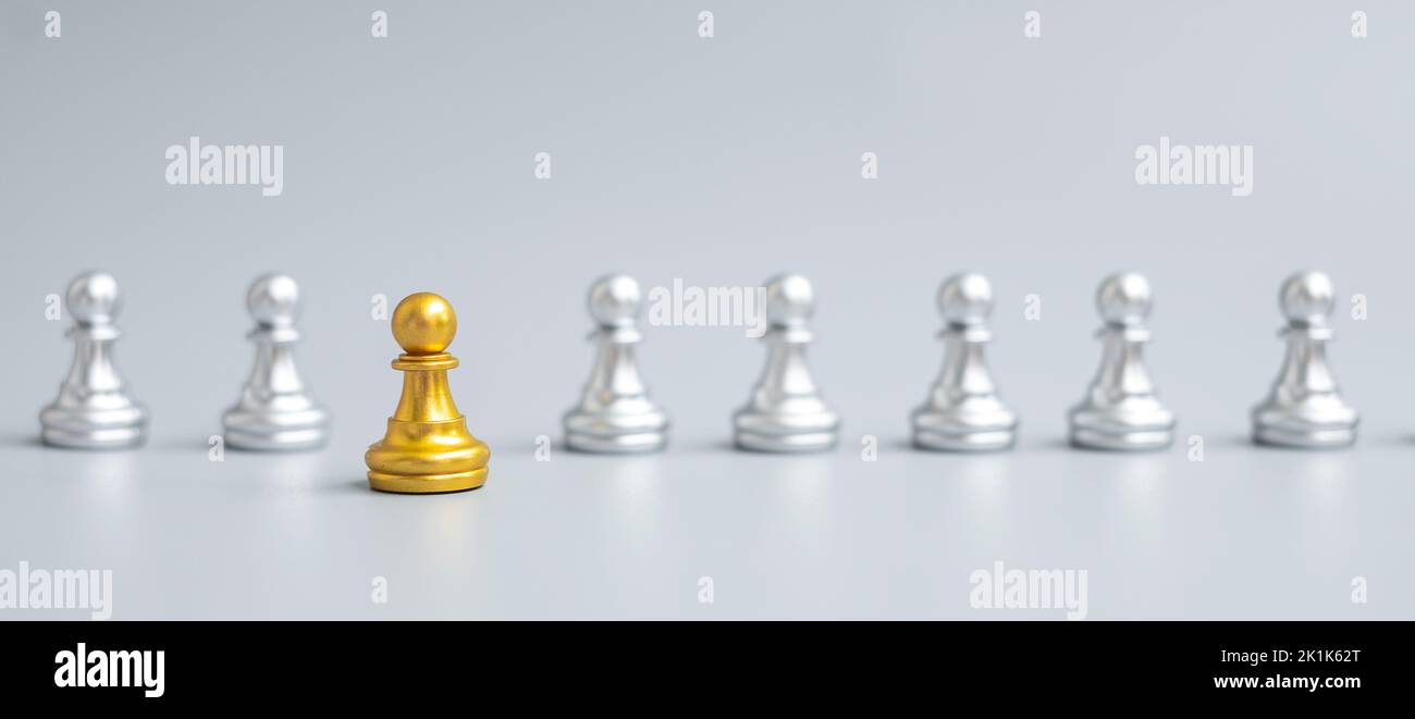Gold Chess Pawn figure Stand out from the crowd on Chessboard ...