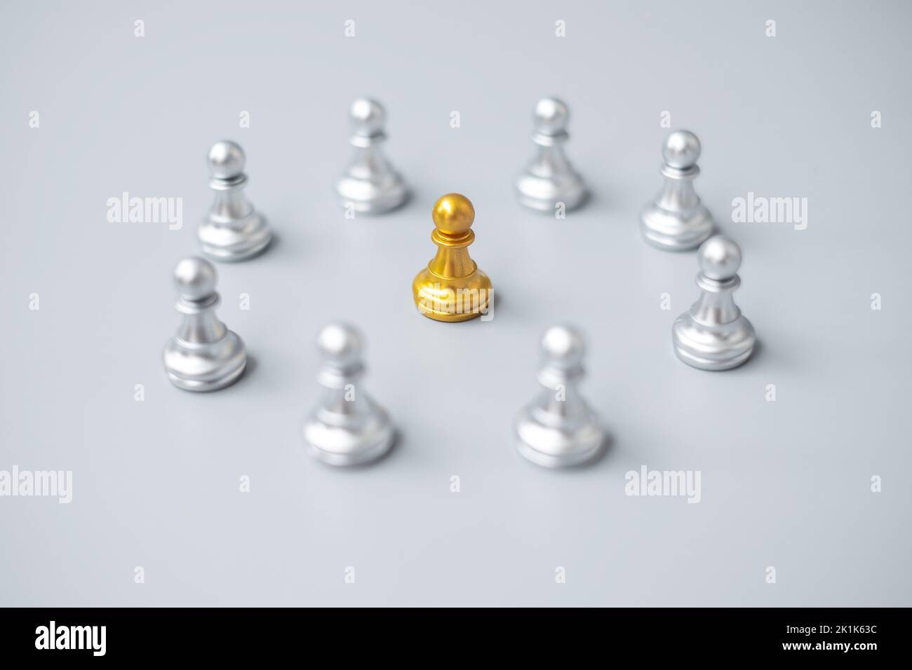 golden chess pawn pieces or leader leader businessman with circle of ...
