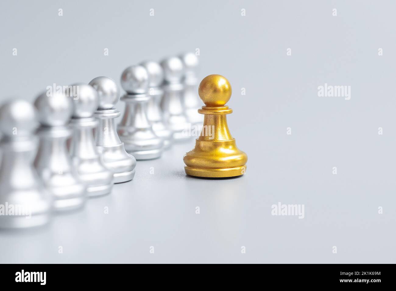 golden chess pawn pieces or leader businessman stand out of crowd ...