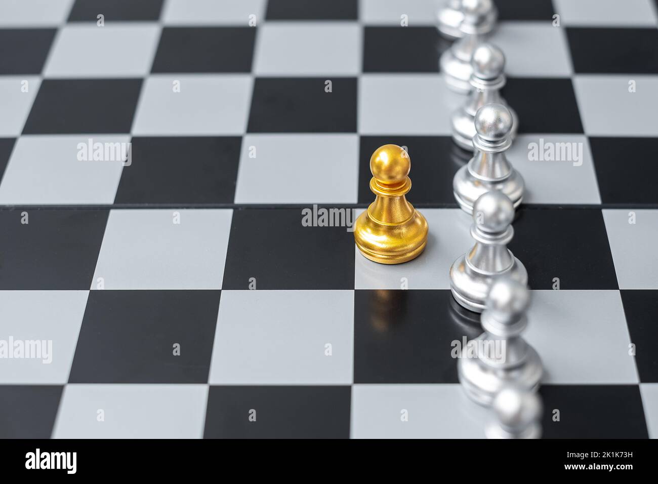 golden chess pawn pieces or leader businessman stand out of crowd ...