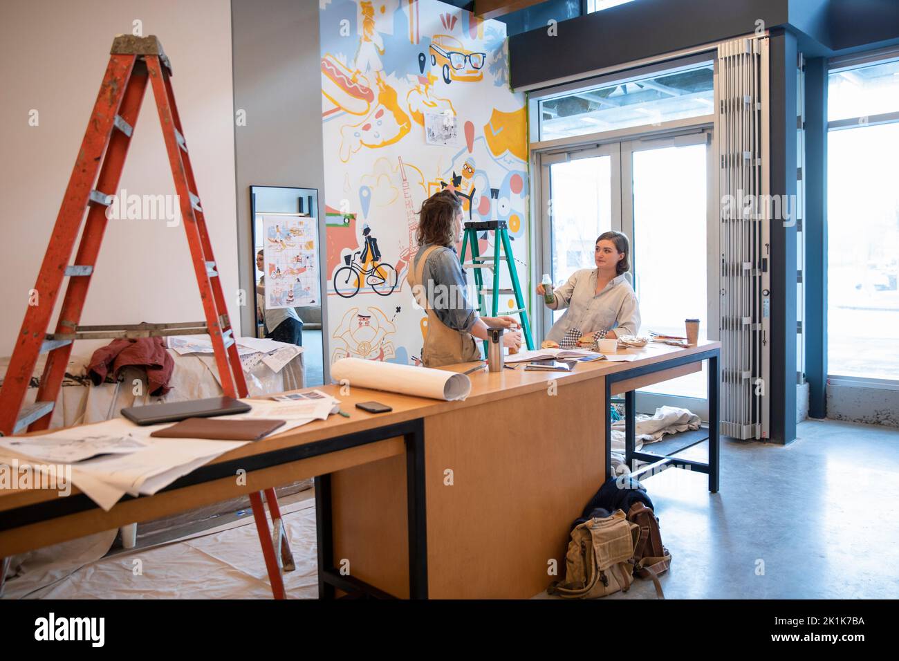 Taking break from painting mural hi-res stock photography and images ...