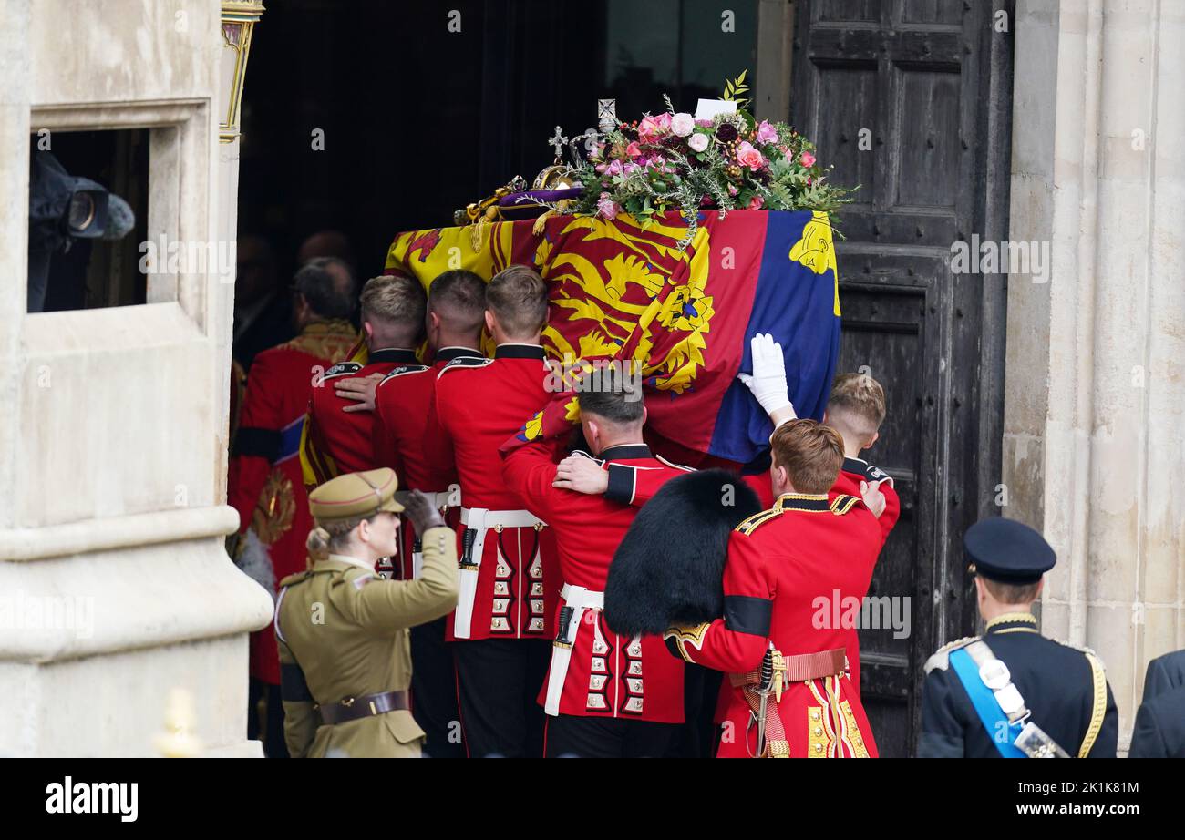 The coffin of Queen Elizabeth II, draped in the Royal Standard with the ...