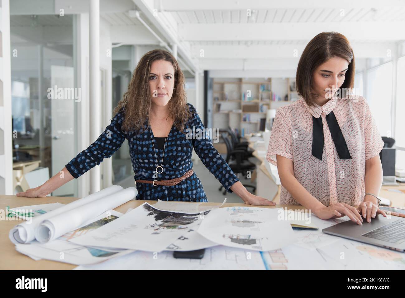 Two women working in creative studio Stock Photo - Alamy
