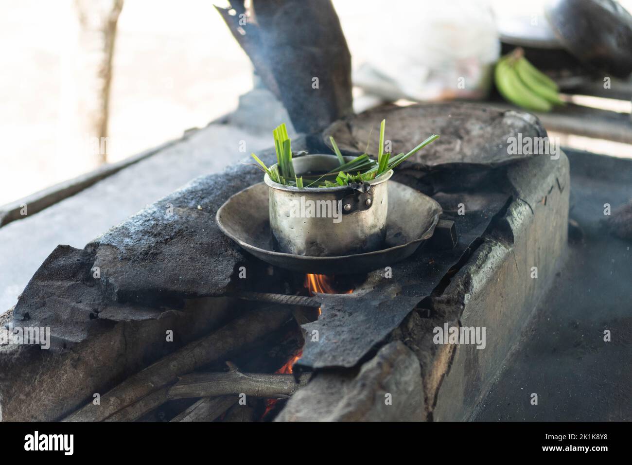Traditional cooking with a rustic stove on the fire Stock Photo - Alamy