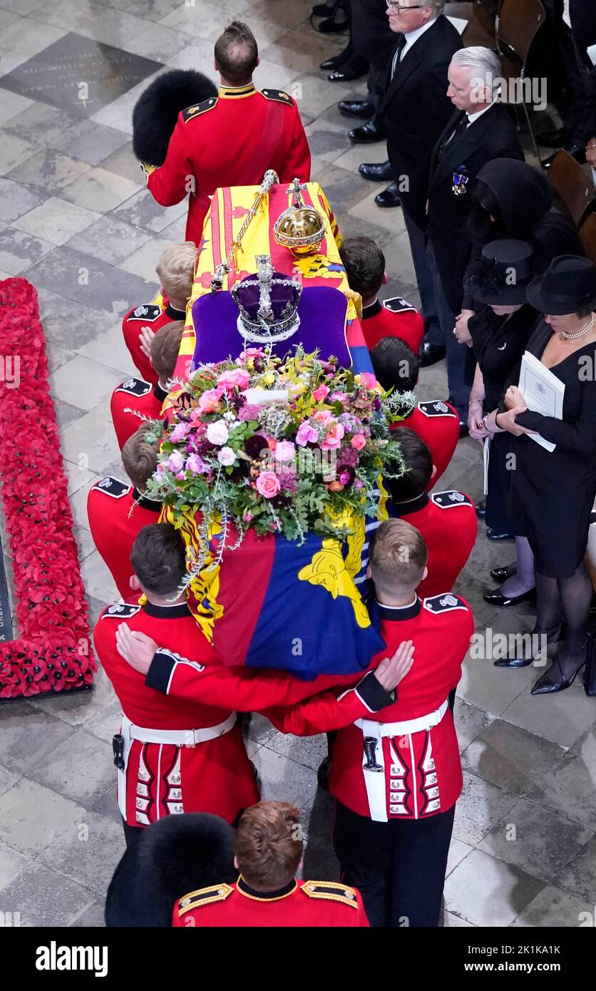 The coffin of Queen Elizabeth II, draped in the Royal Standard with the ...