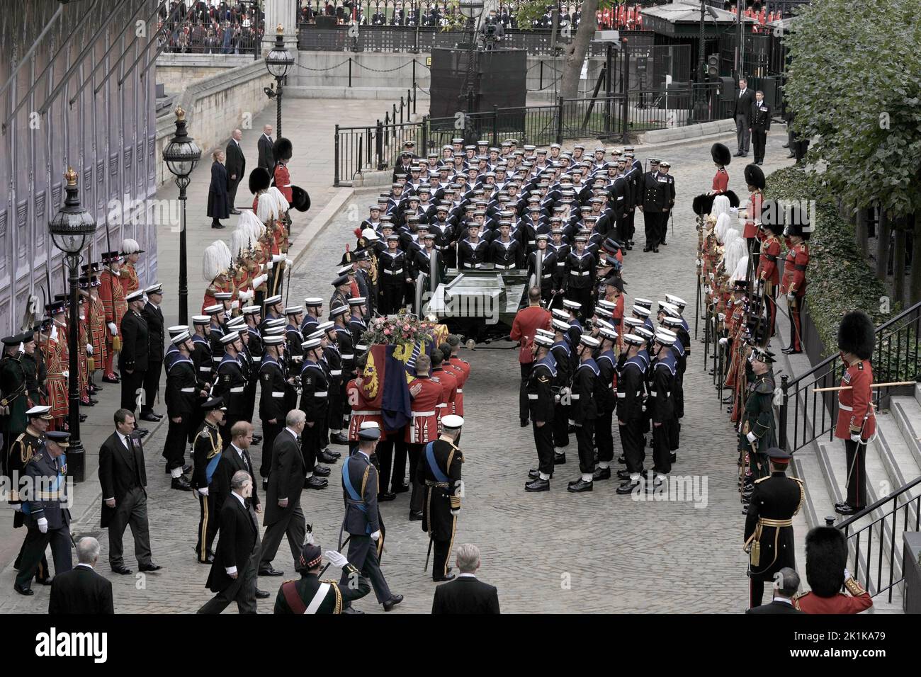 The coffin of Queen Elizabeth II is loaded on to a gun carriage pulled ...