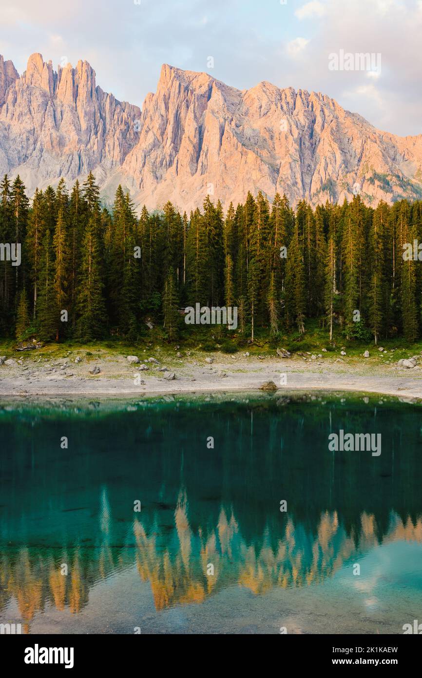 Stunning view of Carezza Lake (Lago di Carezza) with its emerald green ...