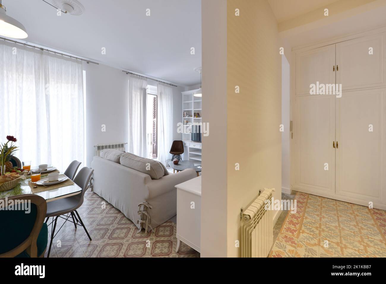 Hall of an apartment and large open spaces towards the living room with ...