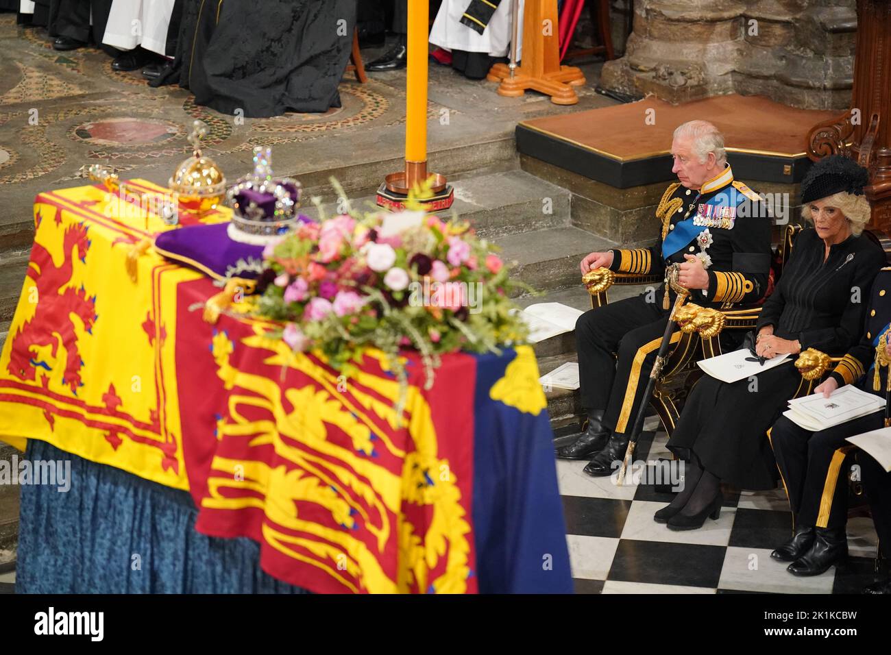 King Charles III and the Queen Consort in front of the coffin of Queen ...