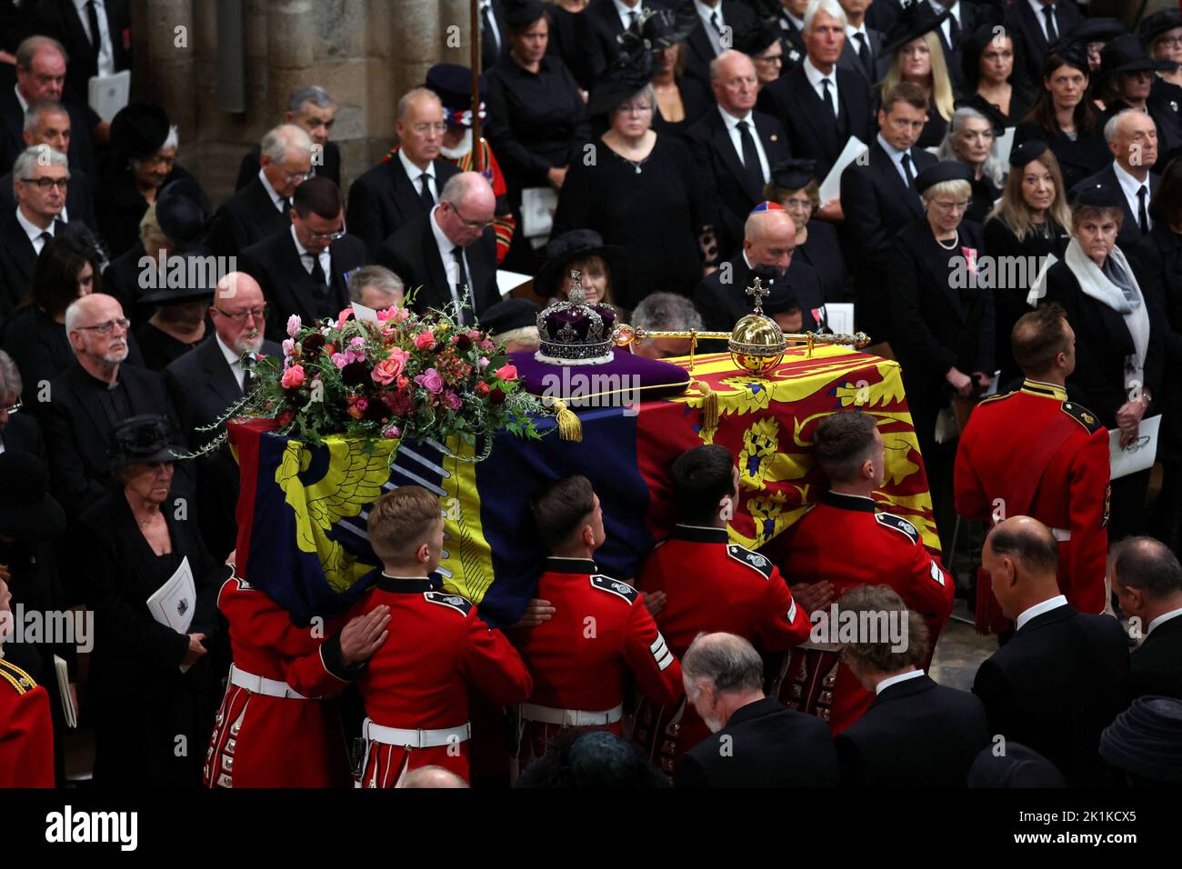 The coffin of Queen Elizabeth II, draped in the Royal Standard with the ...