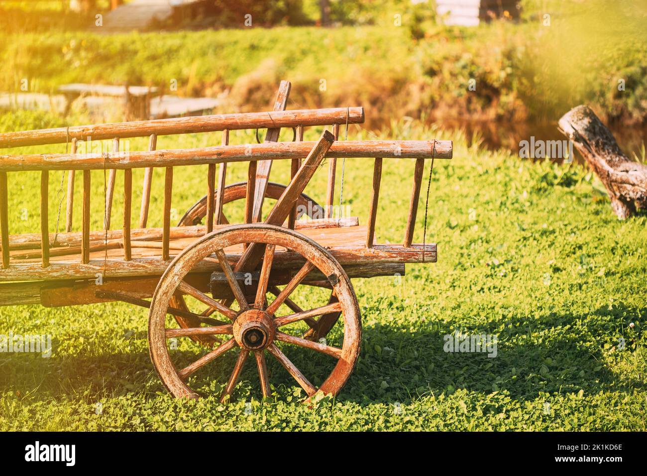 Decorative Peasant Cart On Summer Lawn. Bright Sunny Day. Garden ...