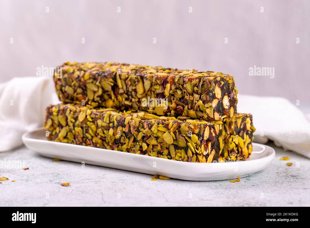 Turkish delight with pistachio on a gray background. Turkish delight ...