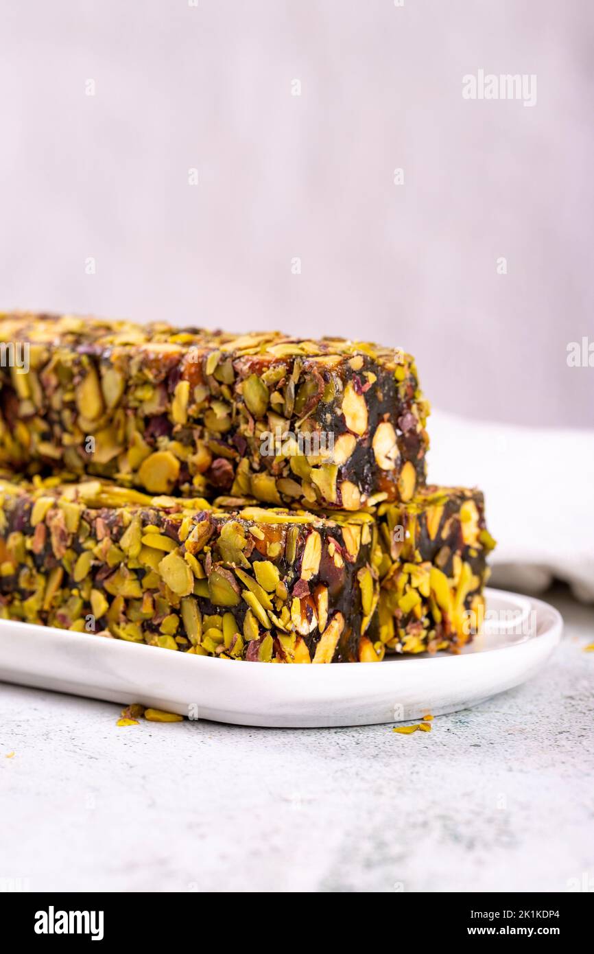 Turkish delight with pistachio on a gray background. Turkish delight ...