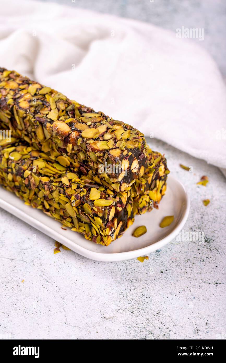 Turkish delight with pistachio on a gray background. Turkish delight ...