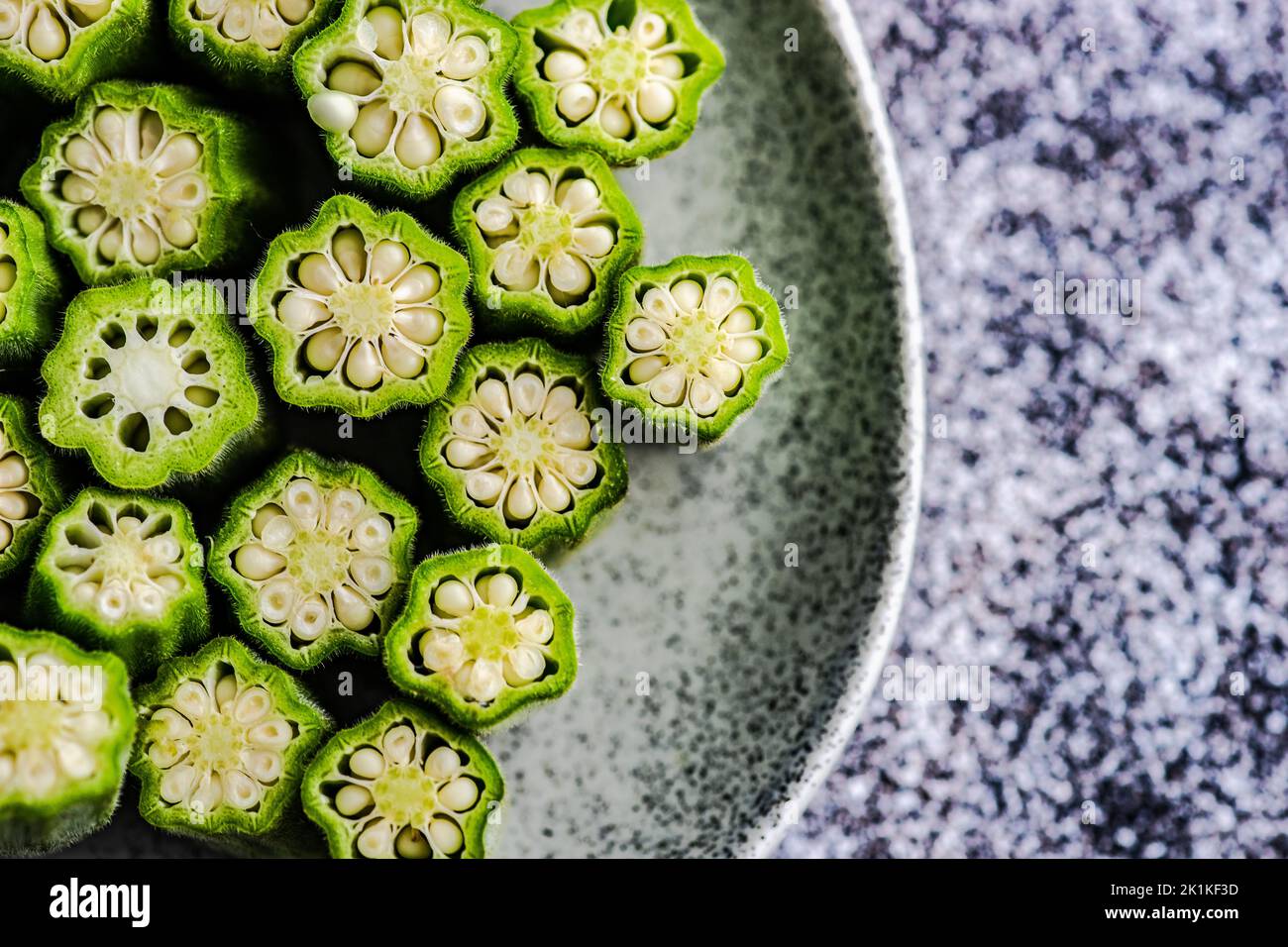 Chopped raw okra hi-res stock photography and images - Alamy