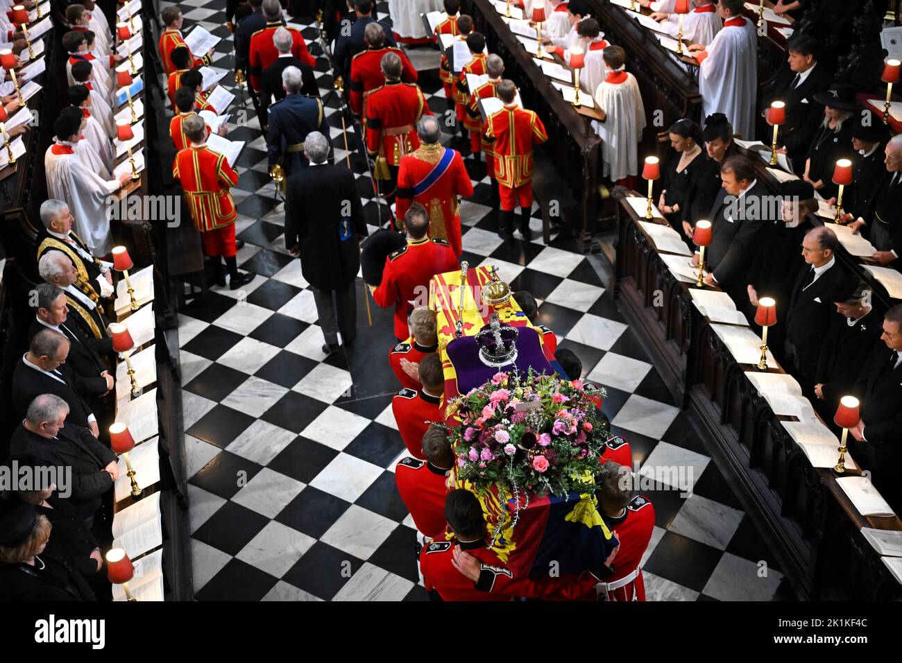 The coffin of Queen Elizabeth II, draped in a Royal Standard and ...