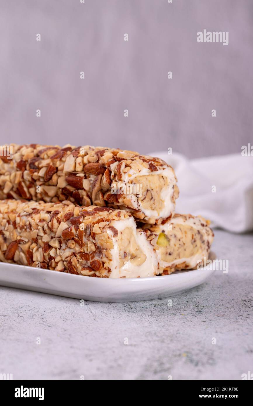 Turkish delight with almonds on a gray background. Turkish delight with ...