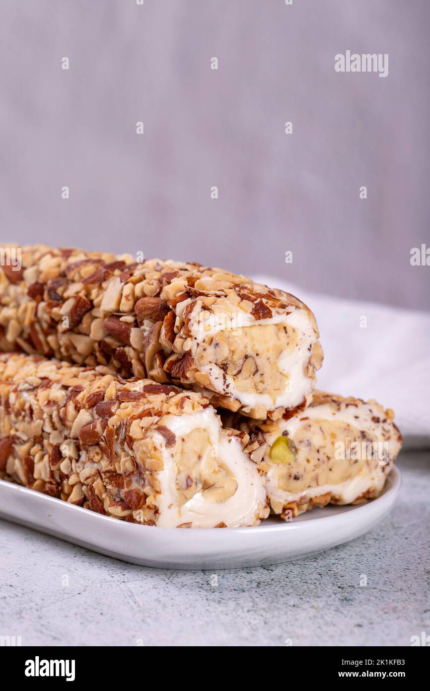 Turkish delight with almonds on a gray background. Turkish delight with ...