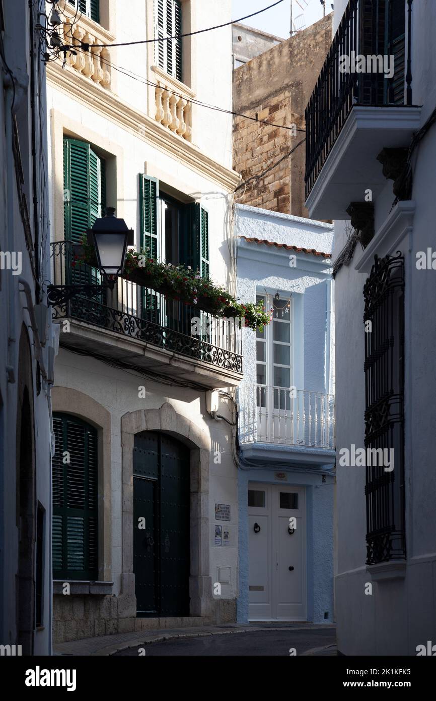 Quaint walkway with Homes in Sitges Centre in Spain Stock Photo - Alamy