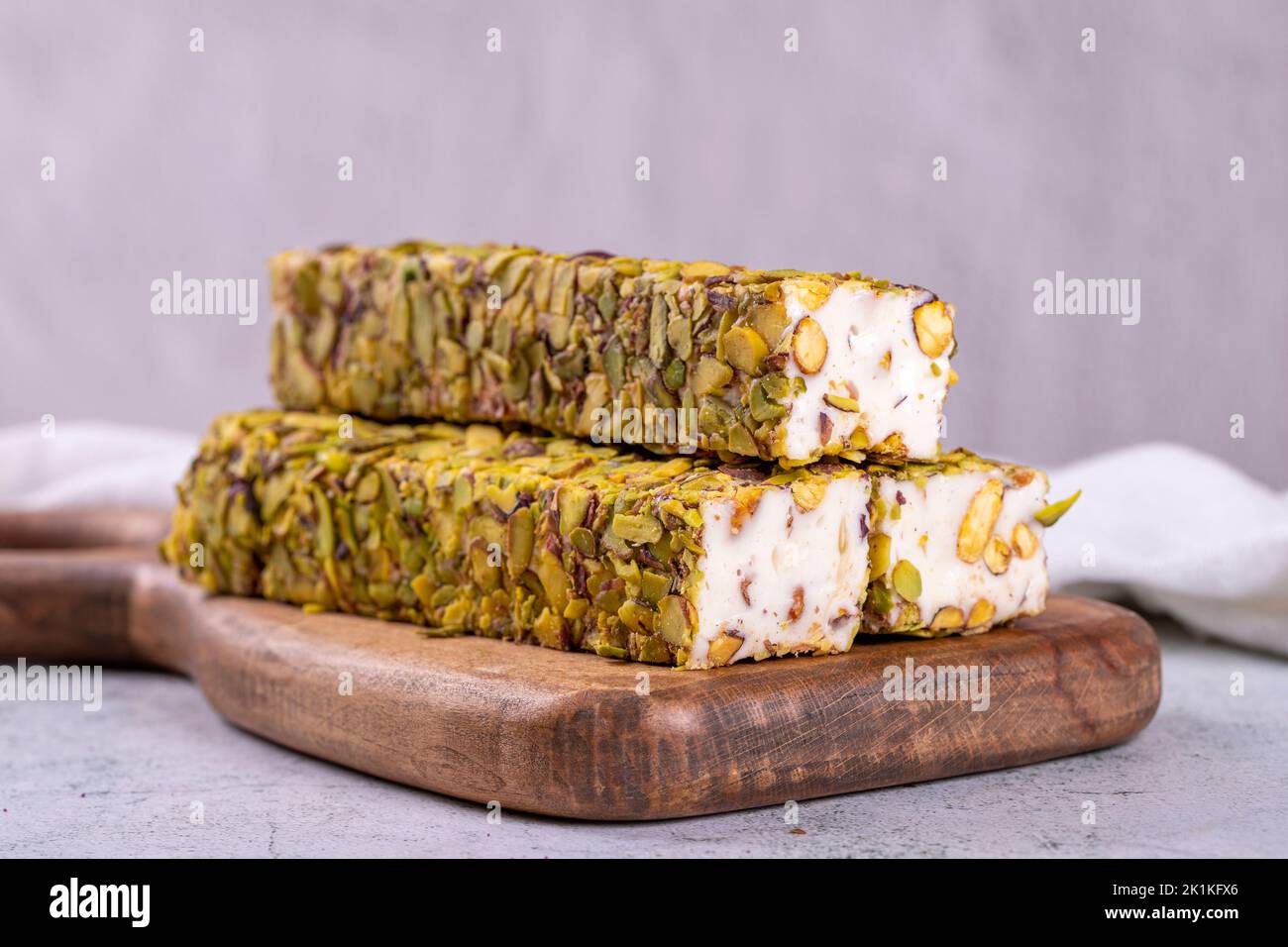 Turkish delight with pistachio on a gray background. Turkish delight ...