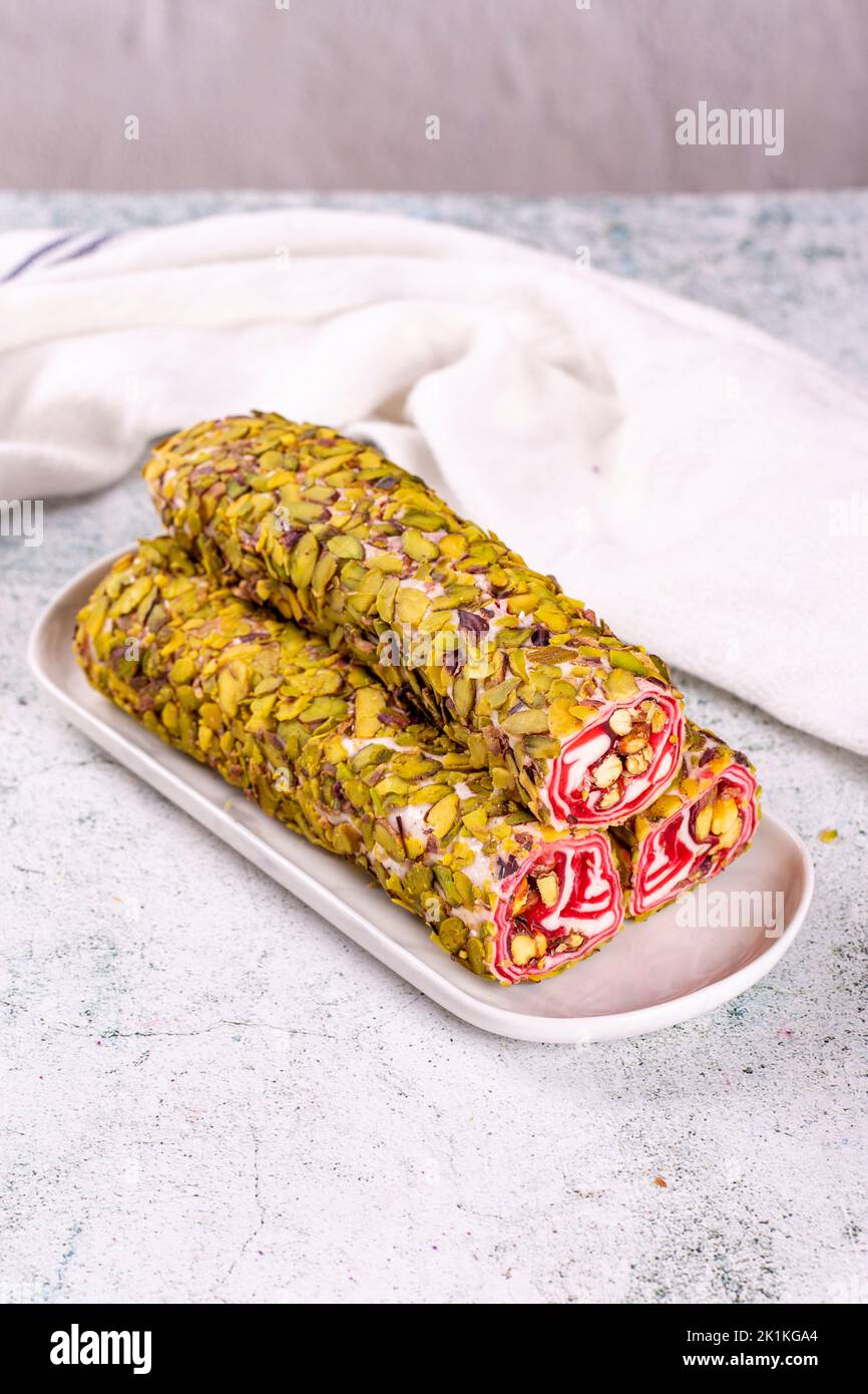Turkish delight with pistachio on a gray background. Turkish delight ...