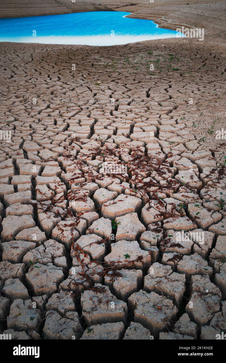 A vertical shot of the dry cracked ground. Arid land, drought Stock ...