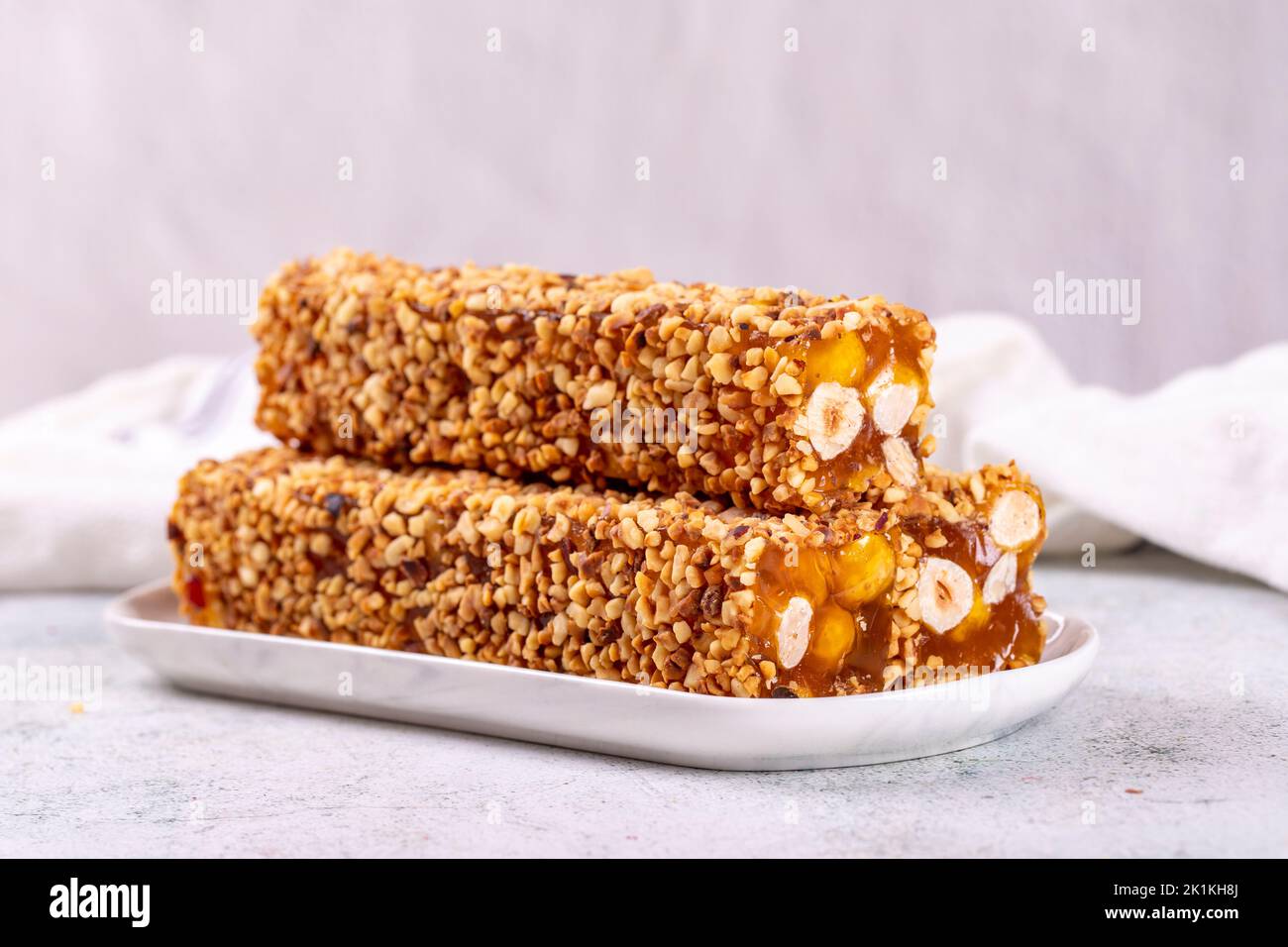 Turkish delight with hazelnut on gray background. Turkish delight ...
