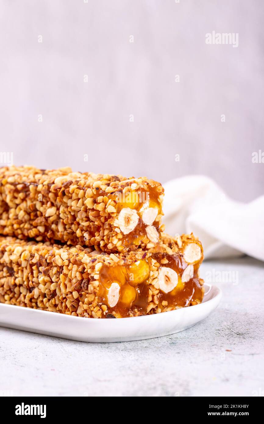 Turkish delight with hazelnut on gray background. Turkish delight ...